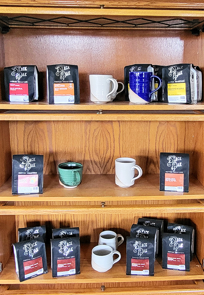 Black Oak Coffee Roasters beans line wooden shelves like caffeinated treasures. In the land of great food, equally great coffee is the unsung hero of any road trip.