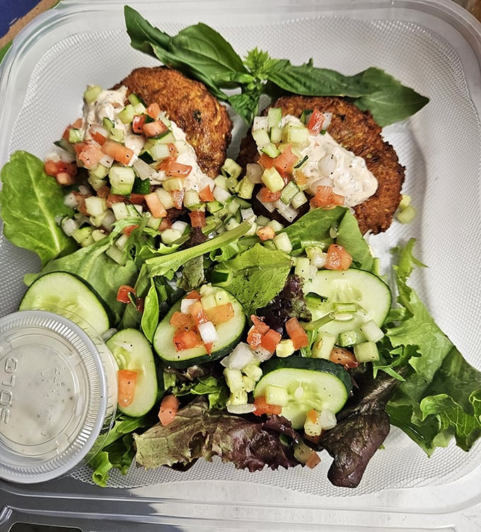 A salad that actually looks like something you'd want to eat. Those crab cakes perched atop fresh greens prove healthy choices don't require sacrifice.