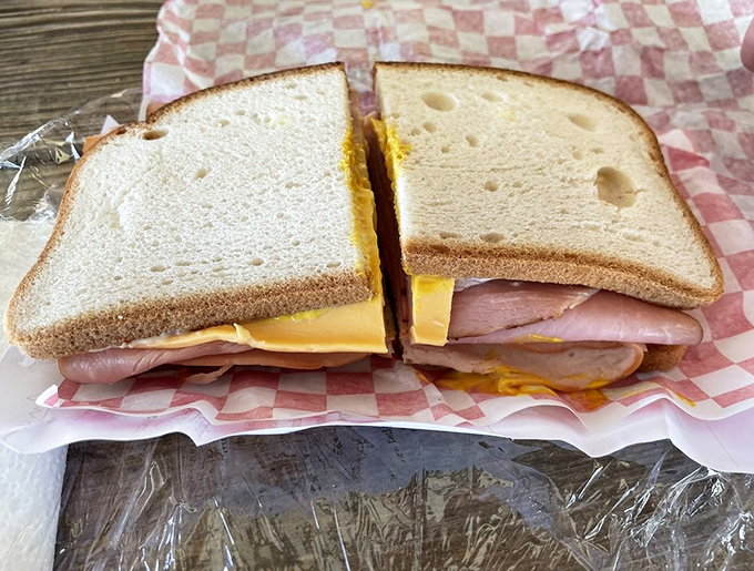 The cross-section reveals the truth &ndash; this ham and cheese sandwich achieves the golden ratio of meat, cheese, and bread that mathematicians dream about.