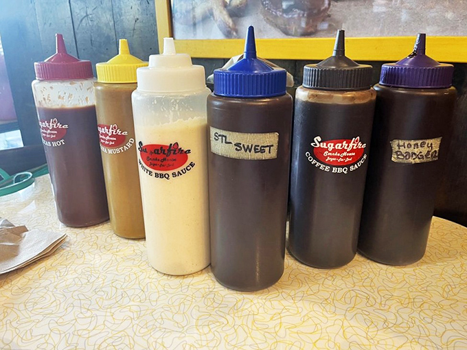 The sauce lineup&mdash;from sweet to heat&mdash;stands ready for duty. Choose your weapon wisely; this decision matters.