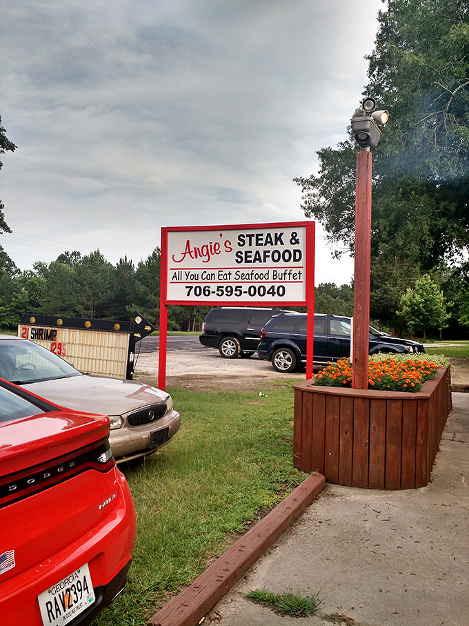 The roadside sign beckons hungry travelers like a lighthouse guiding ships to safe harbor&mdash;except this harbor serves ribeye.
