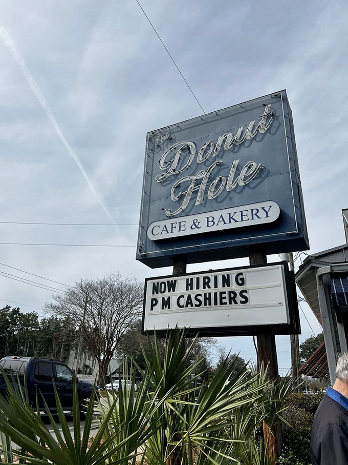 The beacon of breakfast hope along Highway 98. This sign has guided more hungry travelers than any GPS ever could.