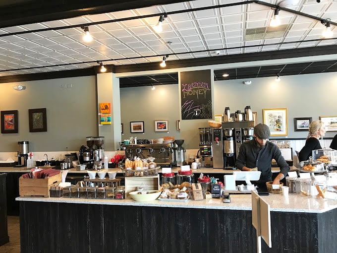 The coffee counter&mdash;where baristas perform their morning magic. Those pastries aren't just baked goods; they're reasons to get out of bed.