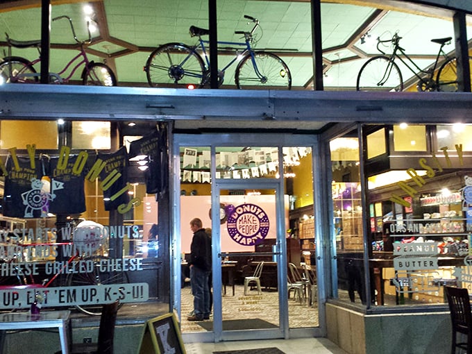 Bicycles in the window, donuts inside, and happiness everywhere. This storefront promises more than just breakfast&mdash;it's selling joy.