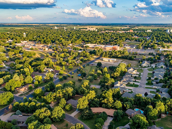 From above, Abilene reveals itself as an oasis of green amid the golden Kansas plains. Those tree-lined streets hide more stories than your favorite podcast series.