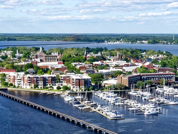 From above, New Bern reveals its perfect positioning where rivers converge, with marinas and historic buildings creating a scene worthy of a model railroad.