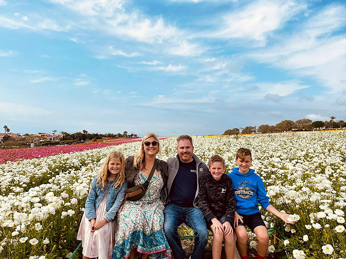 Family memories bloom alongside the ranunculus. Twenty years from now, they'll remember this more vividly than any theme park.