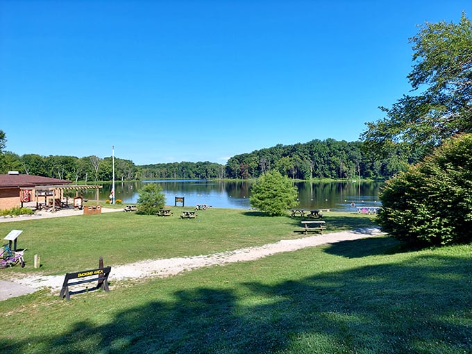 The lakeside picnic area practically demands you slow down. Even sandwiches taste better with this view as a side dish.