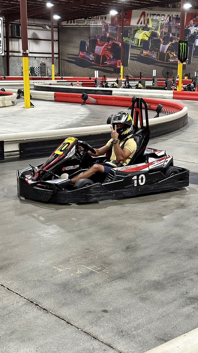 Victory lap or just warming up? Either way, this driver's thumbs-up is the universal signal for "I'm having more fun than should be legally allowed."