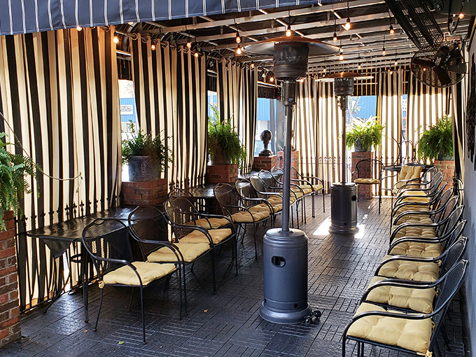 The outdoor waiting area isn't just functional&mdash;it's a promise that good things come to those who wait. Those striped awnings provide shade for anticipation.