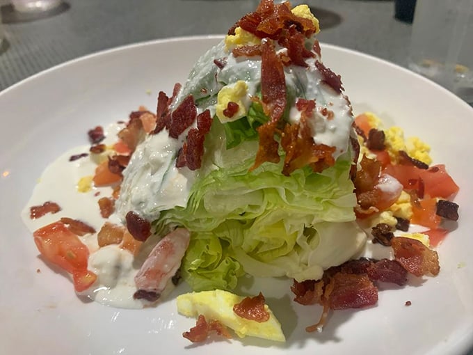 The wedge salad reimagined. A humble iceberg transformed into an architectural marvel that makes veggies momentarily exciting.