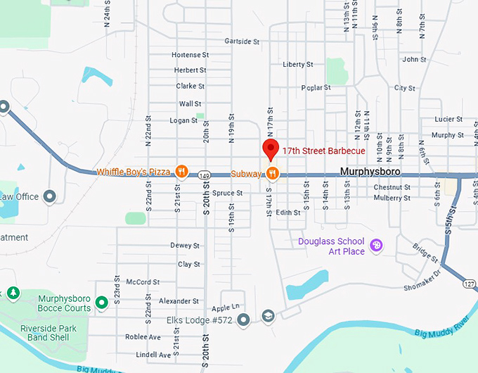 Welcome to BBQ paradise! 17th Street Barbecue's unassuming exterior hides a world of smoky delights within. It's like finding a treasure chest, but instead of gold, it's filled with ribs.