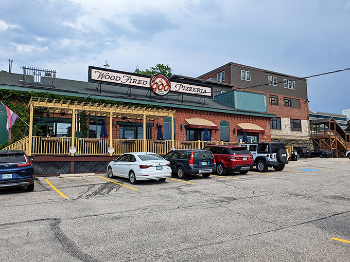 The brick fortress of 900 Degrees stands ready to defend Manchester against mediocre pizza. That wood-fired oven inside is working overtime on dough masterpieces.