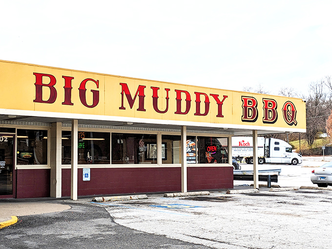 The Big Muddy BBQ's iconic yellow sign promises smoky delights inside this no-frills Hannibal treasure.
