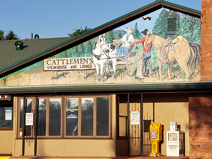 The western mural at Cattlemen's isn't just decoration&mdash;it's a promise of the authentic beef experience waiting inside.