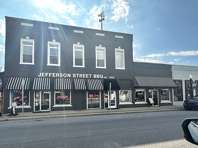 The classic black storefront of Jefferson Street BBQ stands like a sentinel of smoke, promising delicious rewards within those walls.