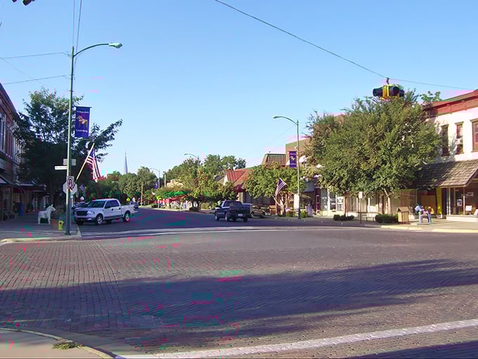 Lindsborg's brick-paved Main Street &ndash; where Swedish charm meets Kansas hospitality. Those American flags add just the right patriotic touch!