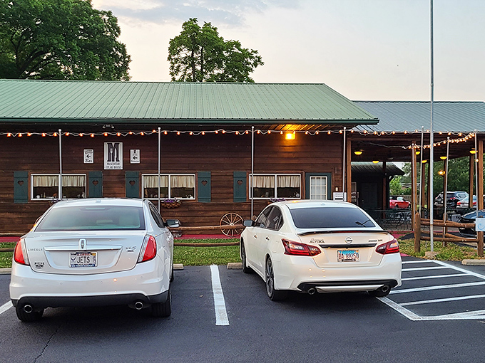Rustic charm with a side of sizzle! Mascoutah Steak House's wooden exterior and twinkling lights promise a cozy steak adventure away from the city hustle.