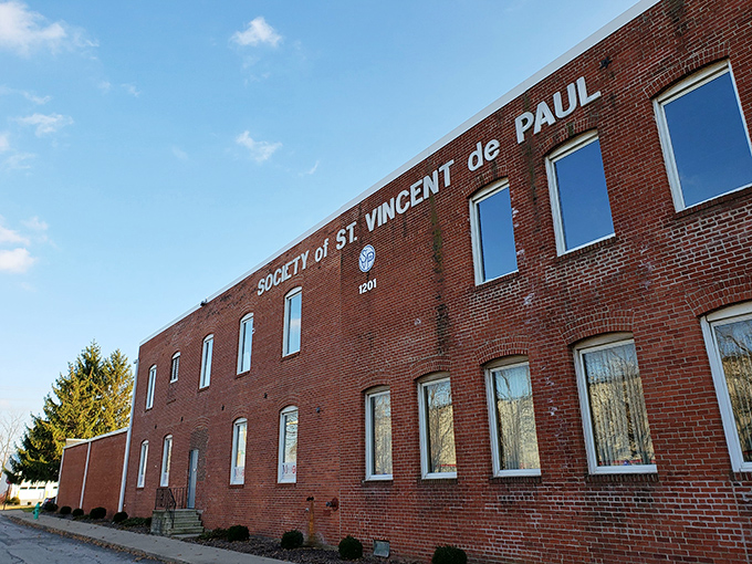 The brick fortress of Mission 27 Resale stands like a cathedral to secondhand treasures, where one person's castoffs become another's salvation.