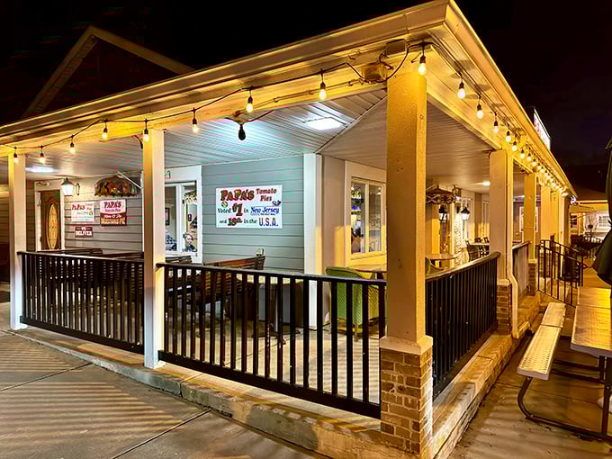 Papa's charming porch welcomes pizza pilgrims like a beacon of hope in the night. String lights and promise of tomato pies&mdash;what more could you want?