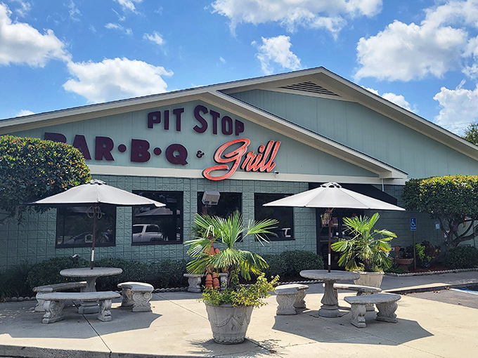 Those outdoor tables aren't just seating&mdash;they're front-row tickets to the smoky symphony happening inside.