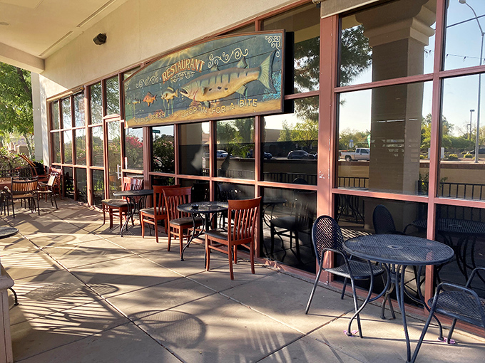 The unassuming patio at Seafood Market & Restaurant – where plastic chairs and extraordinary seafood prove ambiance is overrated.