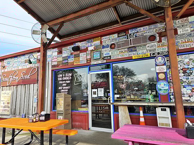 License plate heaven! Southern Soul's exterior is where road trip memorabilia meets smoky paradise—like a barbecue museum that feeds you.