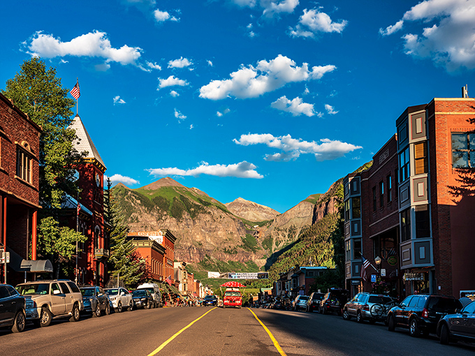 Telluride's main street looks like someone took a postcard and made it real. Those mountains aren't just a backdrop&mdash;they're showing off.