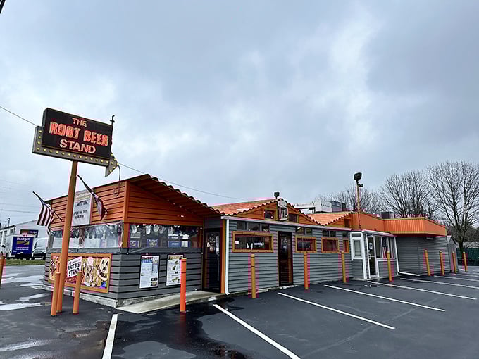 The Root Beer Stand's iconic orange signage promises a time-traveling hot dog experience that your taste buds won't forget.