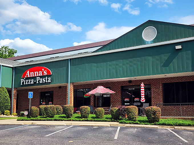 The green-roofed sanctuary of pizza perfection sits quietly, waiting to transform ordinary lunches into memorable feasts.