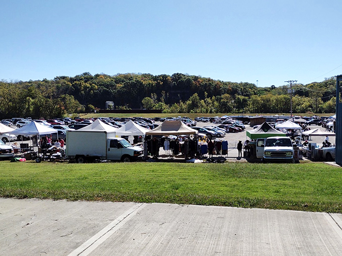 The parking lot transforms into a bargain bazaar under clear Kansas skies&mdash;early birds with coffee cups strategically plotting their treasure map.