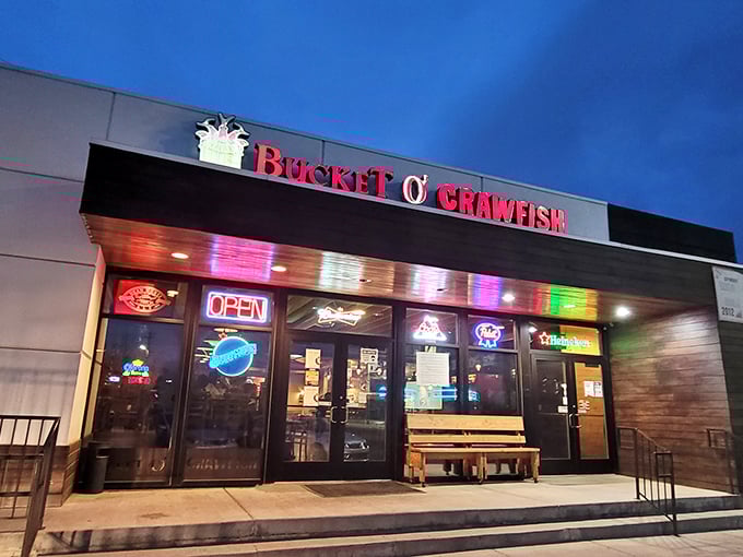 Night falls and Bucket O' Crawfish lights up like a neon-drenched love letter to Louisiana cuisine.