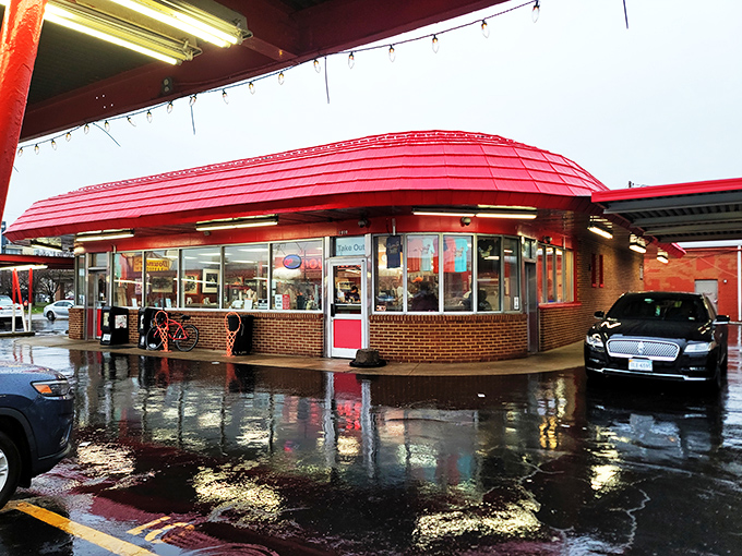Even in the rain, Doumar's stands defiant &ndash; a neon-lit promise that comfort food waits for no weather forecast.