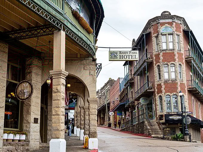The Basin Park Hotel stands tall in Eureka Springs like a grand old dame who's seen it all and kept the best stories.