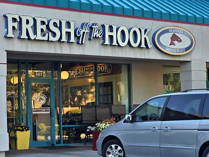 The blue-trimmed entrance beckons seafood lovers like a lighthouse for the culinarily shipwrecked. Trust me, salvation awaits inside.