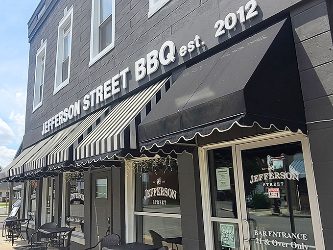 Those black and white awnings aren't just for show&mdash;they're signaling that serious, no-nonsense BBQ happens behind these doors.