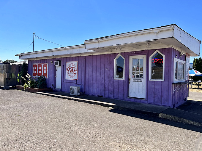 This little red BBQ joint proves what grandma always said - never judge a smokehouse by its corrugated metal porch.