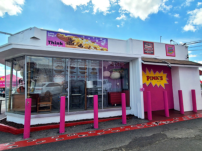 The vibrant pink and white exterior isn't subtle, but neither are the flavor bombs waiting inside this Hollywood hot dog institution.