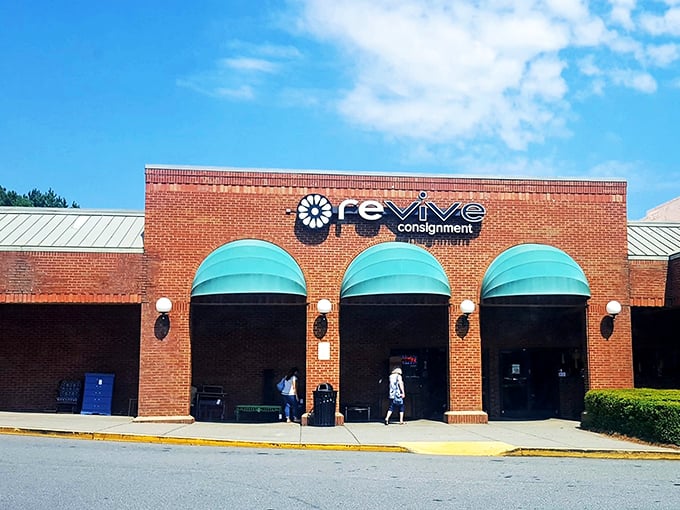 Behind these brick walls and cheerful awnings lies a treasure trove where designer labels meet small-town prices.