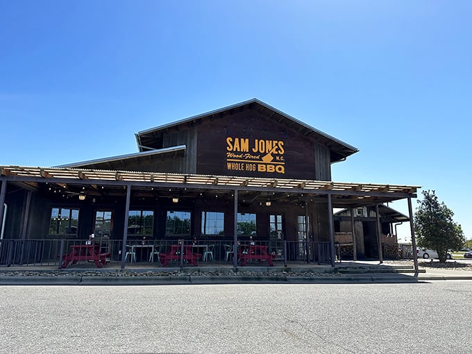 Where tradition meets innovation &ndash; Sam Jones BBQ's welcoming porch practically whispers "come sit a spell" before the meat sweats begin.
