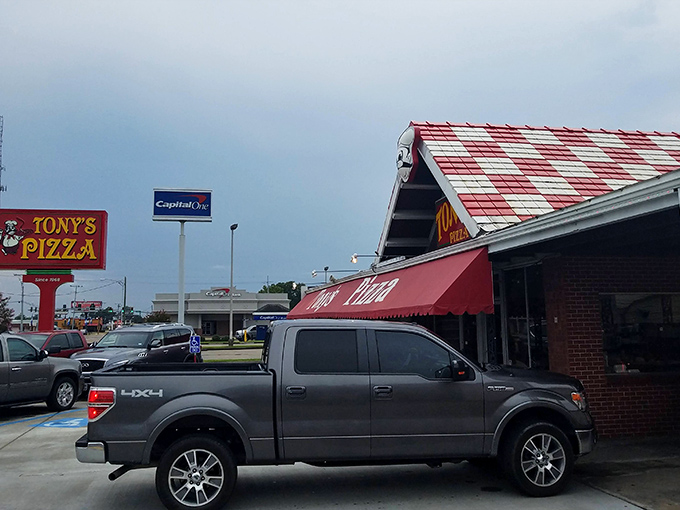 That classic A-frame roof isn't just architecture &ndash; it's a pizza cathedral where cheese dreams come true.