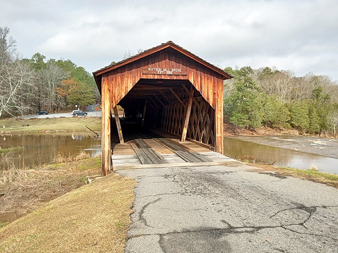 Step into a time machine disguised as a wooden tunnel. This 229-foot marvel has been welcoming travelers since 1885, when "viral" meant something entirely different.