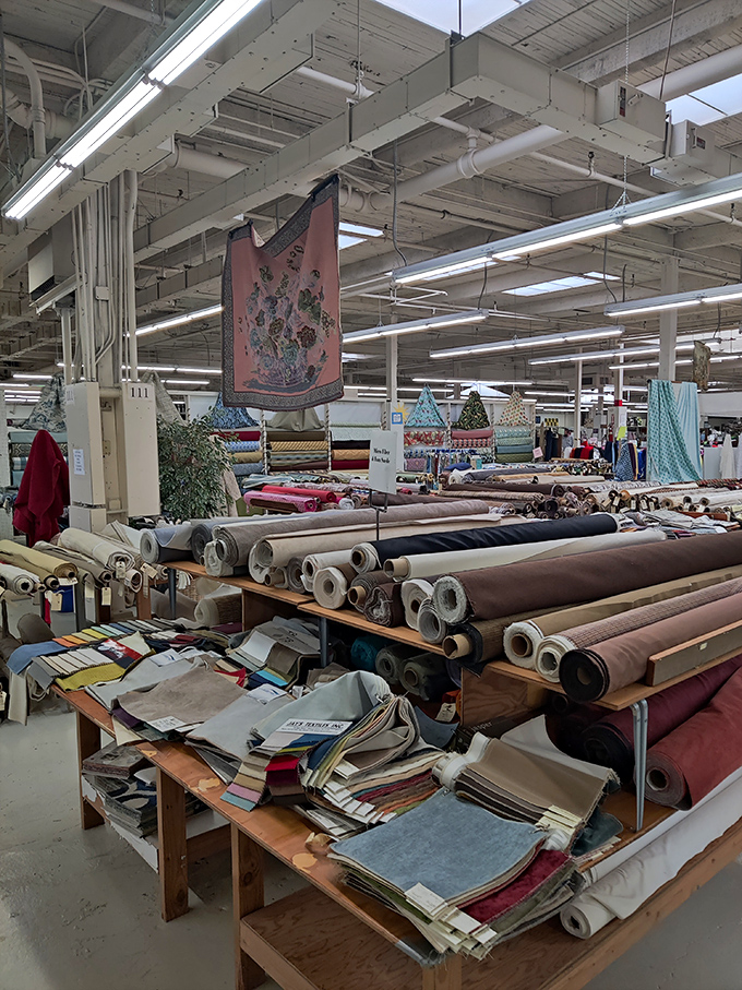 Fabric rolls stacked to the heavens create a textile topography that would make Lewis and Clark rethink their expedition plans.