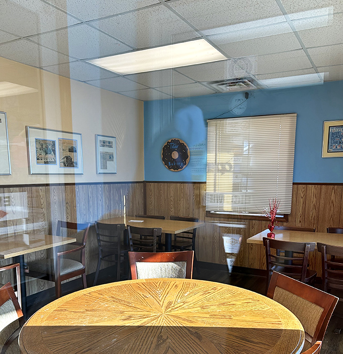 The cozy dining area invites lingering conversations over coffee and pastries, where wooden tables have witnessed countless sugar-fueled epiphanies.