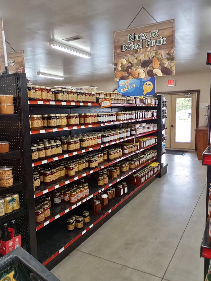 Rows of homemade preserves line shelves like edible jewels, each jar a testament to the notion that good things come in glass containers.