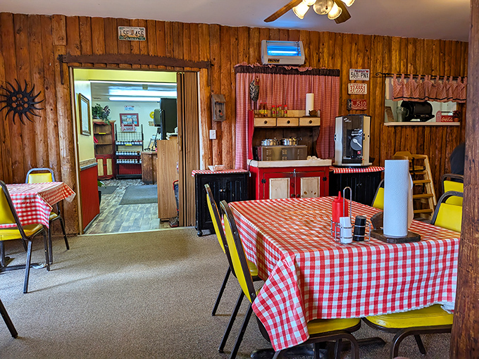 Classic red-checkered tablecloths and wood-paneled walls create the perfect backdrop for serious barbecue business. No Instagram filters needed here.