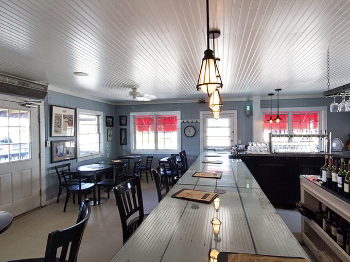 Inside, nautical simplicity reigns with beadboard ceilings, pendant lights, and a communal table that's witnessed countless "first oyster" moments.