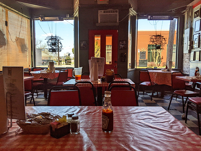 Red checkered tablecloths and simple chairs tell you everything: this place cares about steak, not showing off. The best theaters have the plainest seats.