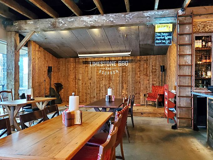 Wooden beams, corrugated metal ceiling, and sturdy tables create the perfect rustic backdrop for the serious business of barbecue consumption.