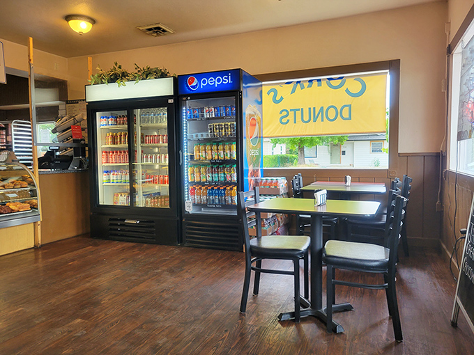 Simple tables, no-nonsense decor, and a cooler full of drinks—Cork's interior focuses on what matters: getting exceptional donuts from display case to your eager hands.